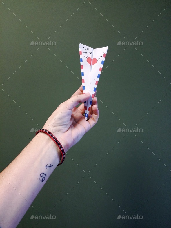 Valentine's paper airplane note - You make my ️ SOAR Stock Photo by nikmock
