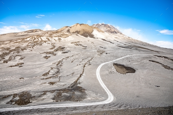 Footpath to Etna Volcano with smoke in winter, volcano landscape in ...