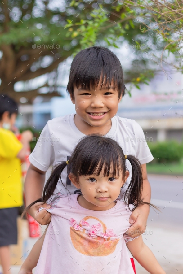Portrait image of happy children. Asian siblings, brother and sister ...