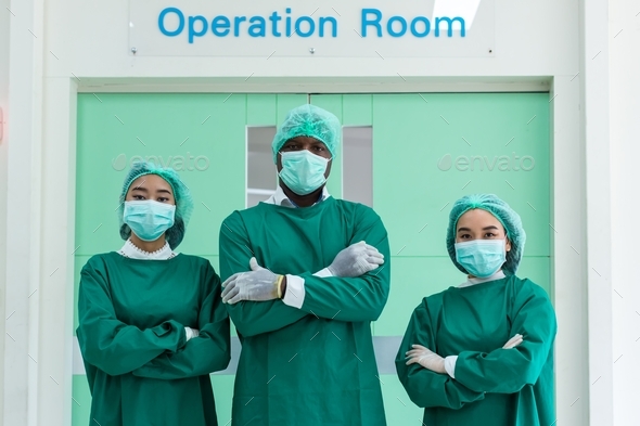 Surgeon team in an operating room . Doctor team standing in the ...