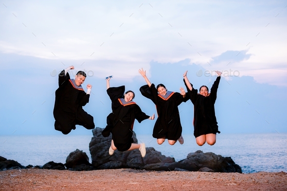 Graduation graduate jumping in the Air. Stock Photo by kckate16 | PhotoDune