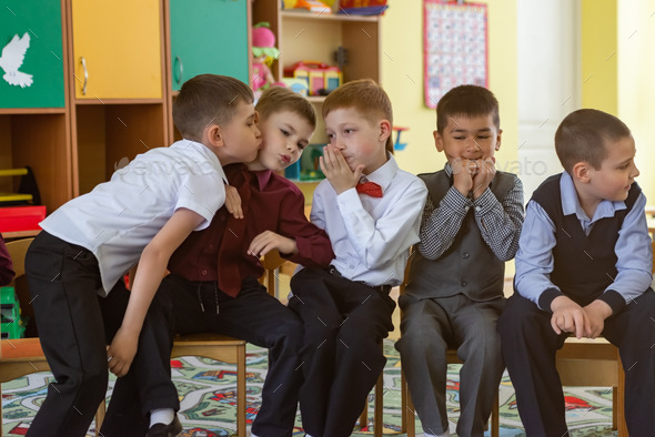 Graduation in kindergarten, holiday. Group of friends four guys. Well ...