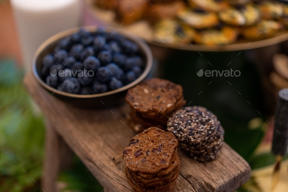 Crackers and berries on a grazing table of food at a party Stock Photo ...