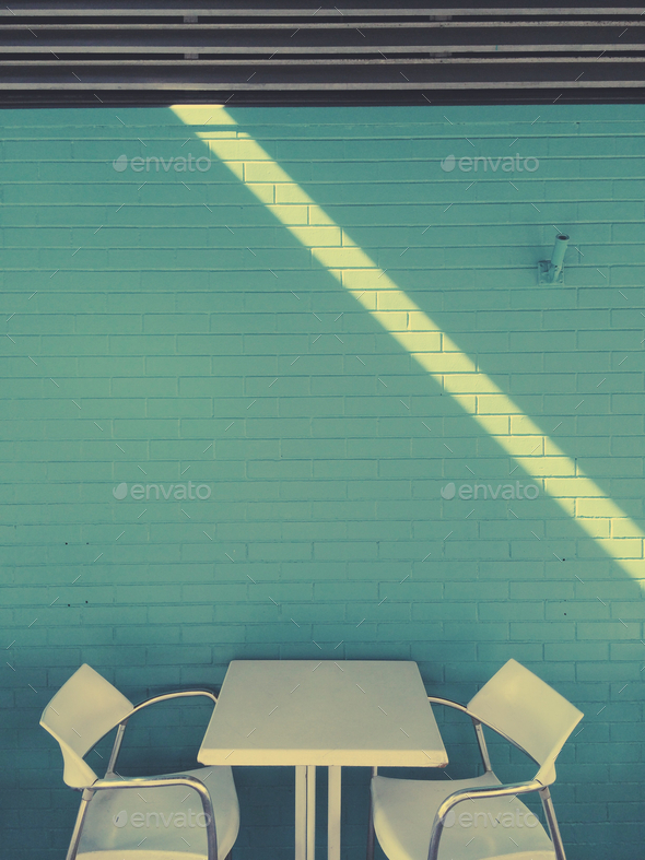 White outdoor cafe tables for two Stock Photo by naokawa | PhotoDune