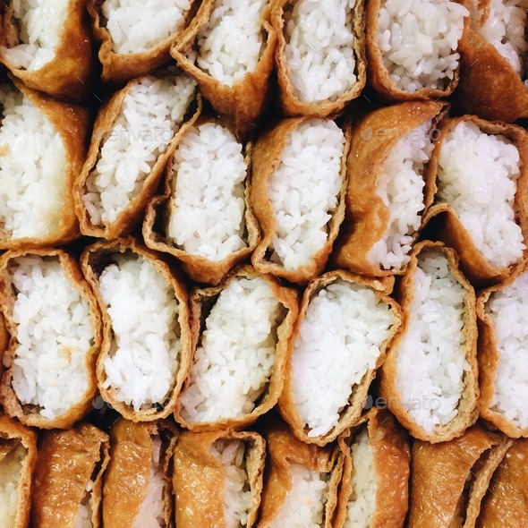 Inari sushi - Japanese fried tofu stuffed with vinegar rice Stock Photo ...