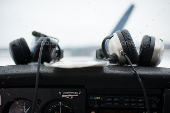 Cessna cockpit pair of headset on dashboard Stock Photo by naokawa