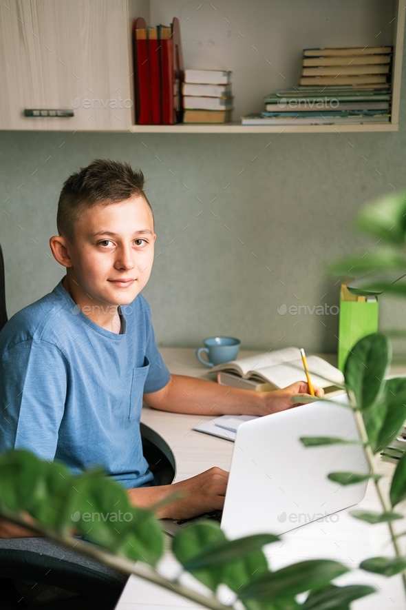 Laptop on the student's desk with the broadcast of the classroom. Stock ...