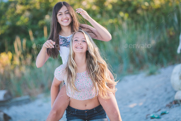 Tweens having fun at the beach Stock Photo by umuller | PhotoDune