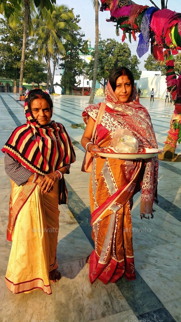 Two Indian women have come to pay homage at the shrine of Patharchapuri ...
