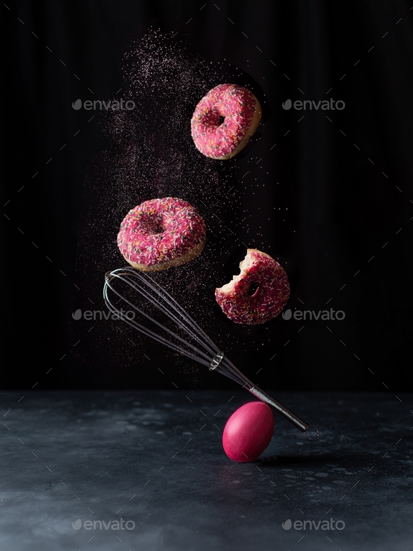 Balancing food photo levitation with donuts, whisk, egg. Stock Photo by ...