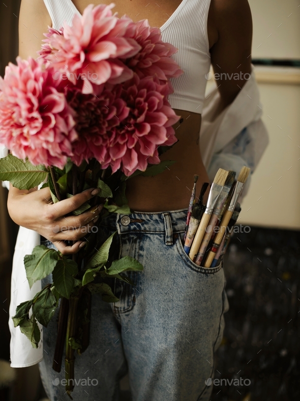 Human body art. Painting process. Creative person with flowers and ...