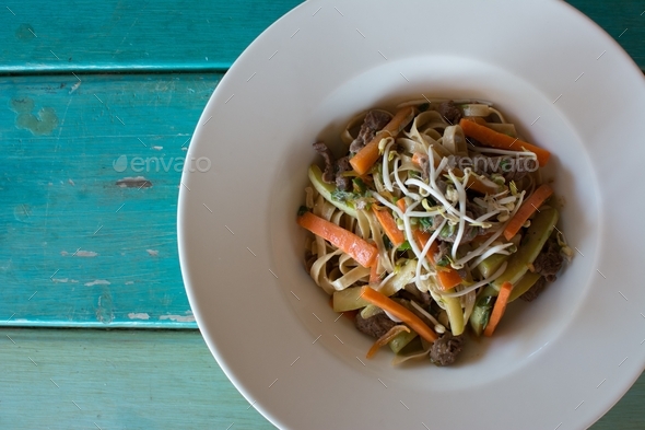 Thai style pasta. Meat and vegetables Stock Photo by jdvolcan | PhotoDune