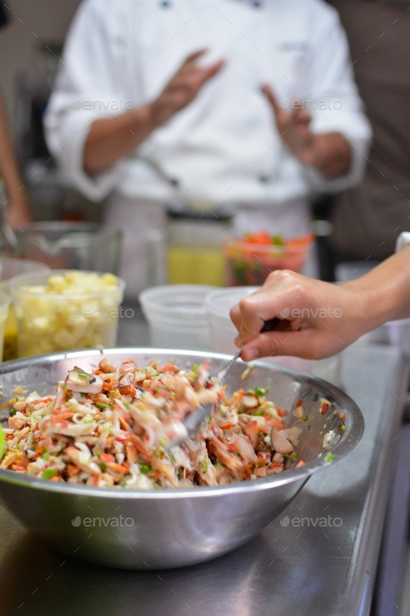 Cooking class. Teacher teaching how to make ceviche. Chef. Workshop ...