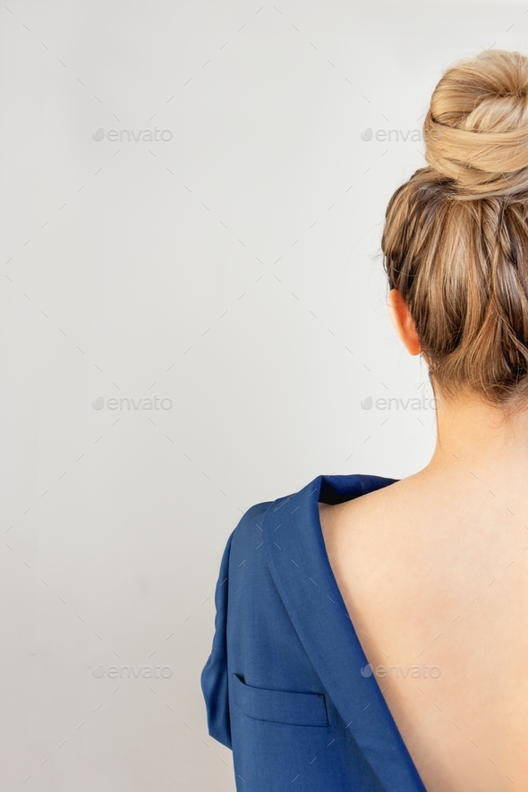 masculine and feminine. woman in a man's jacket. Female back. Stock ...