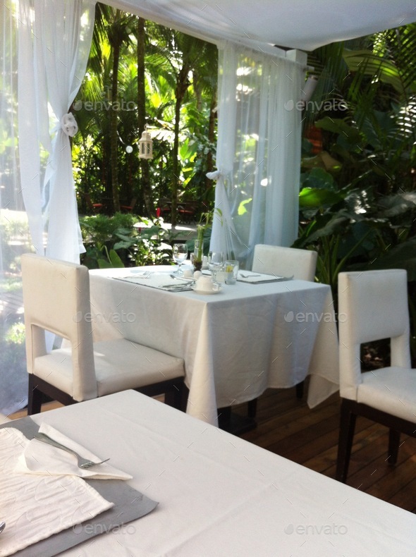Airy Outdoor restaurant on grounds of resort in jungle Stock Photo by ...