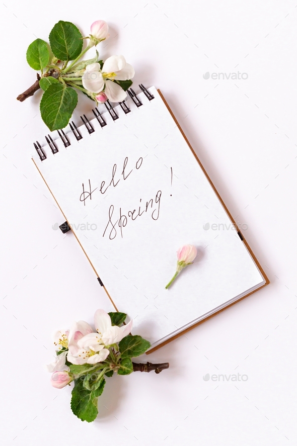 hello spring-notebook page with handwritten text and spring apple ...