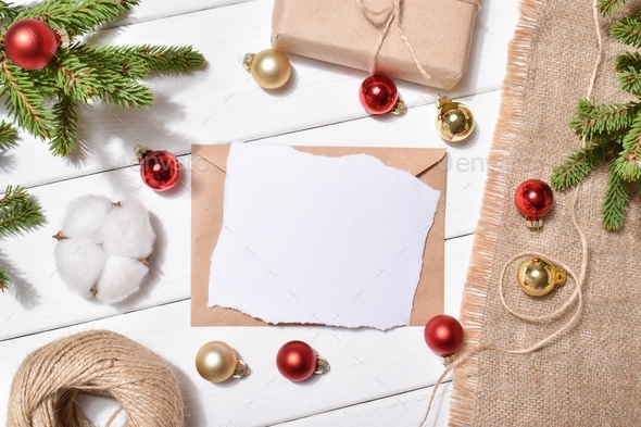An empty invitation on a white background with a Christmas tree and ...