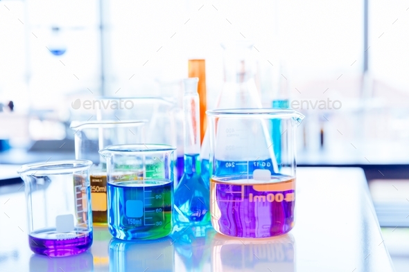 Colorful mix chemical in science glassware flask at lab science ...