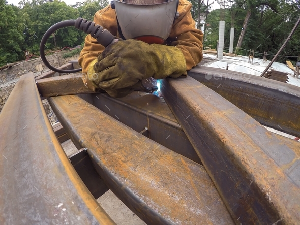 Welding work, welder welding metal material in heavy industry ...