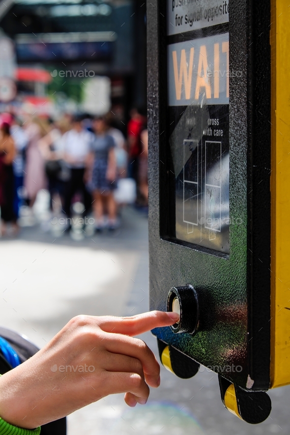 Pressing pedestrian traffic crossing control box Stock Photo by iportret
