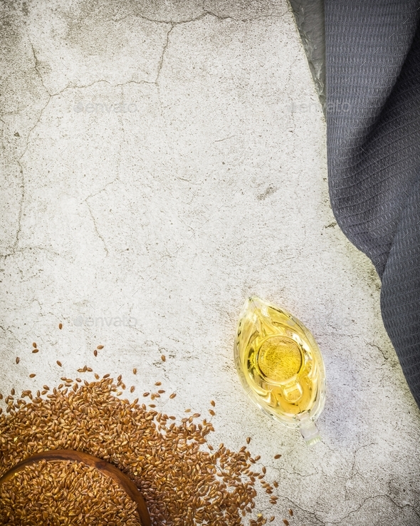 Linseed oil, flax seeds, salad dressing in gravy boat source of omega-3 ...
