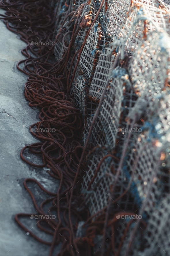 Vertical view of various metal fishing traps and scattered ropes. Close ...