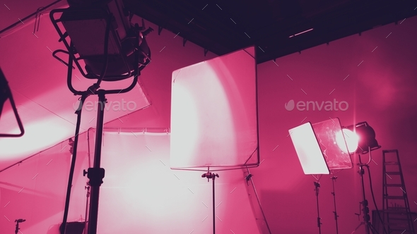 Flash light on tripod in studio production set up for professional ...