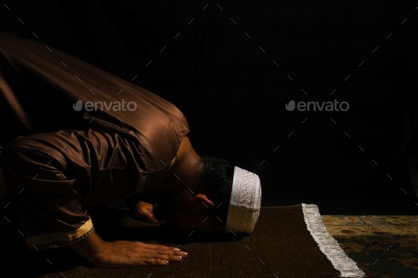 Prostrate to god at night Stock Photo by najmi1990 | PhotoDune