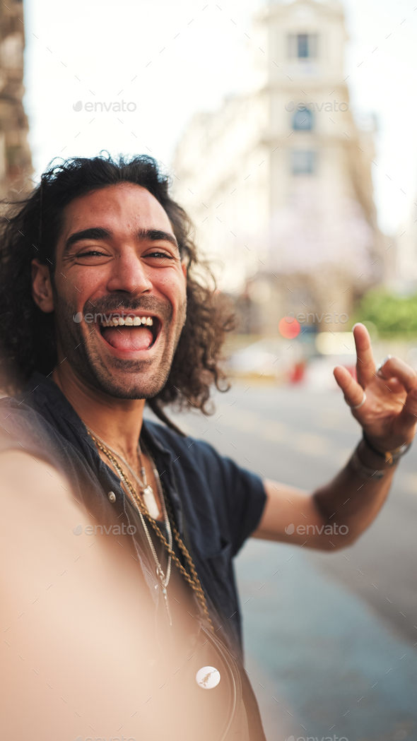 Clouse-up,young italian guy takes selfie on mobile phone Stock Photo by ...