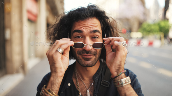 Young attractive italian guy looks into the camera and smiles at old ...