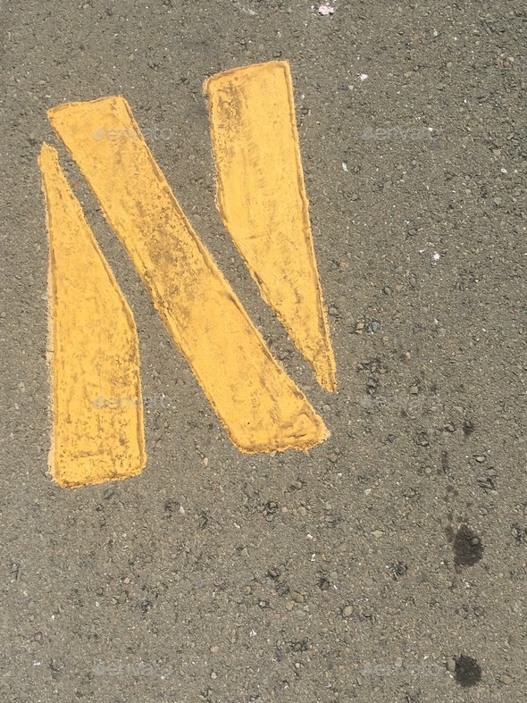 Yellow letter N print Stock Photo by statuslapa | PhotoDune