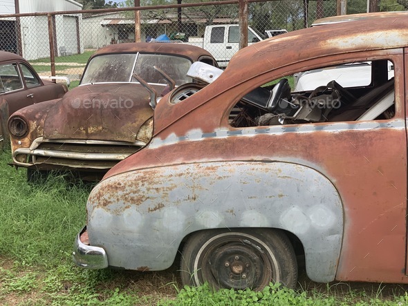 Vintage rustic car parts graveyard Stock Photo by statuslapa | PhotoDune