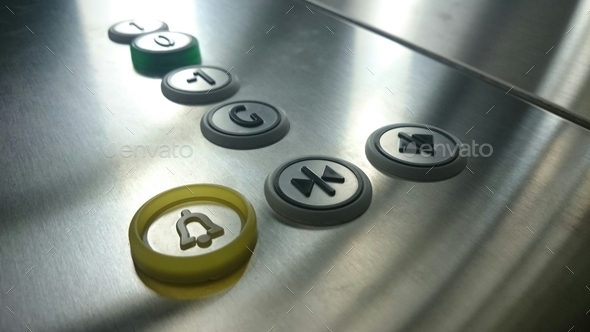 Tech elegant and modern elevator buttons on silver brushed metal bottom ...