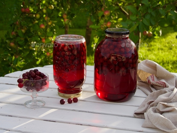 cherry compote drink on garden background Stock Photo by bodan22 ...