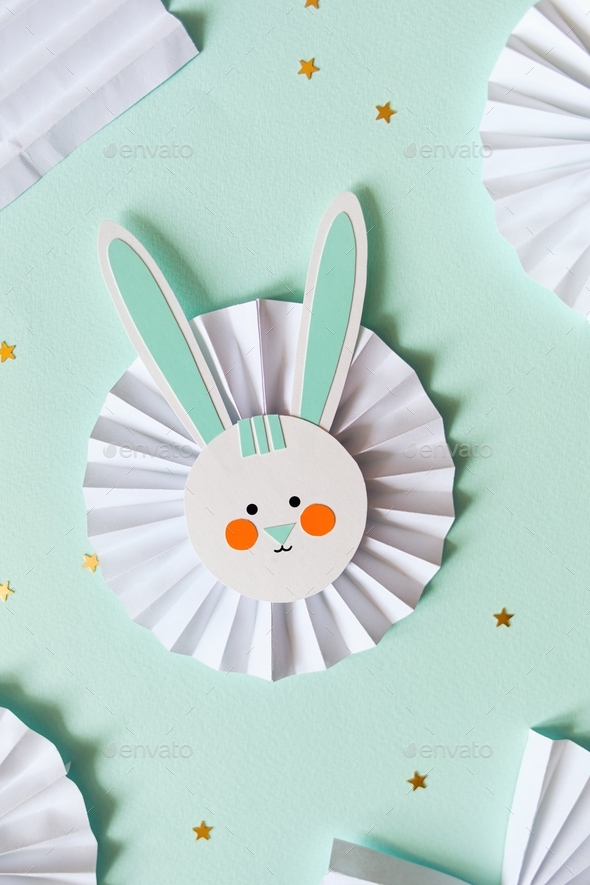 easter paper craft for kids. paper DIY bunny on mint background. spring ...