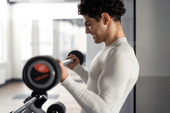 barbell cardio exercise for biceps body, trainer athlete doing sports ...