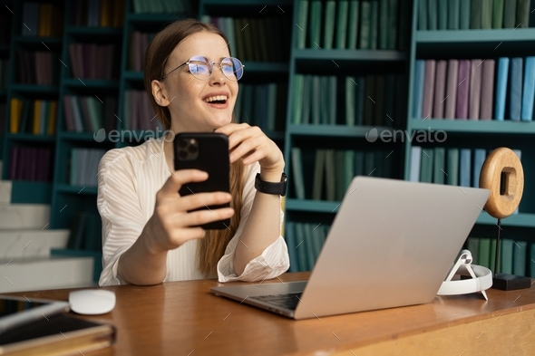 workplace uses laptop computer woman with glasses manager works in ...