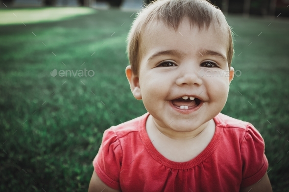 Happy smiling baby with a few teeth showing Stock Photo by hwilson8