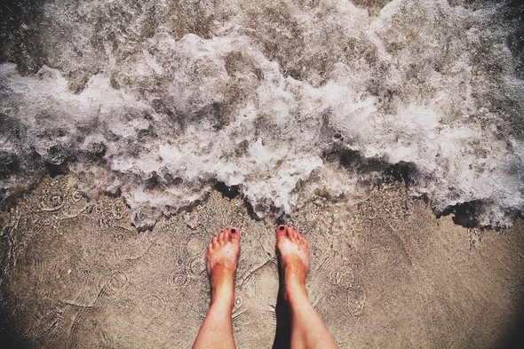 Feet in the waves ocean Stock Photo by hwilson8 | PhotoDune