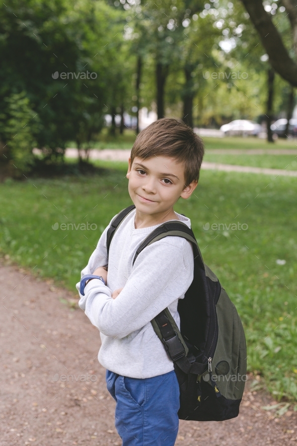 Back to school, happy boy with a backpack Stock Photo by svetlanas13