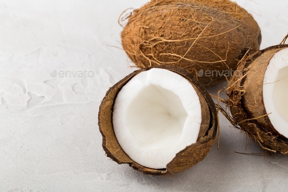 Split coconut on a gray background Stock Photo by svetlanas13 | PhotoDune