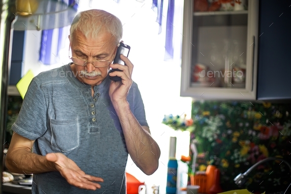 Old man with gray hair and a mustache, of the baby boomer generation ...