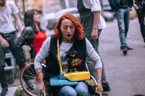 Shocked girl in a wheelchair scared of falling down the stairs Stock ...