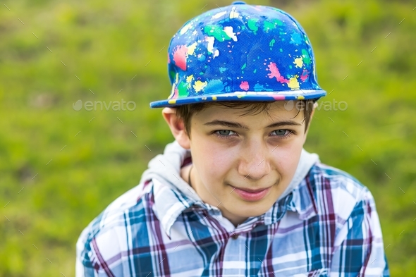 Portrait of a teenage boy in a cap Stock Photo by christening | PhotoDune