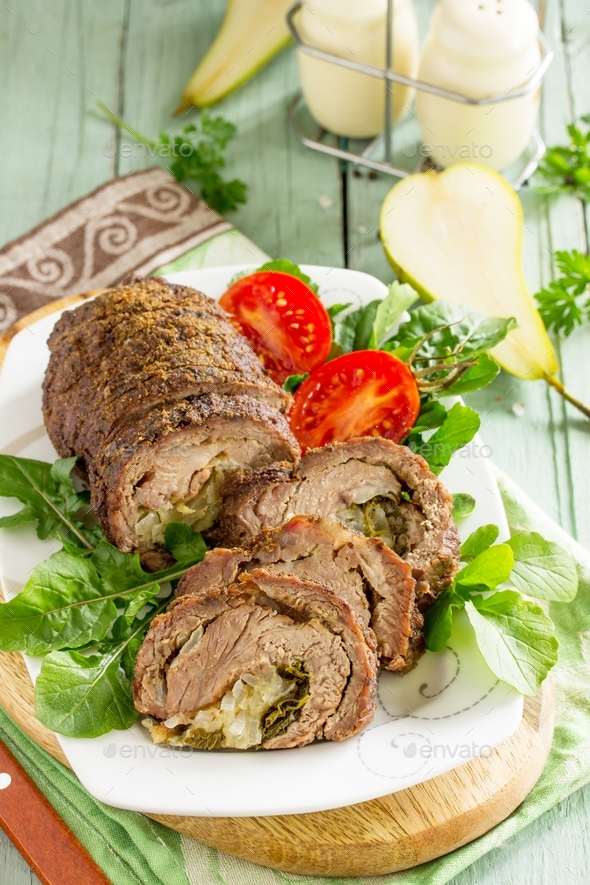 Stuffed Meat Roll with Pear and Cheese on a festive Thanksgiving Day ...