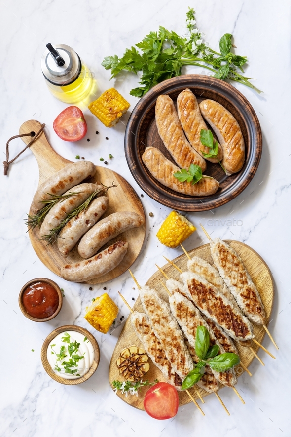 Summer party food. Grill food menu. Various bbq grilled sausages with ...