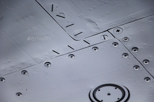 Aircraft skin close up. Rivets on gray metal. Aluminum texture Stock ...
