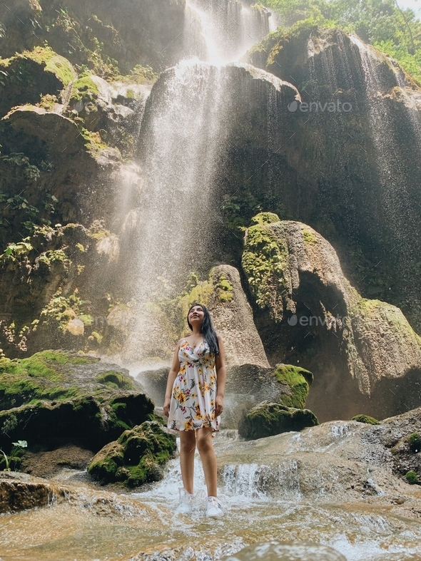 girl in the middle of a waterfall Stock Photo by edgar_rood | PhotoDune