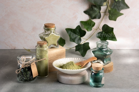 Spirulina Chlorella algae powder in a glass jar . Stock Photo by ...