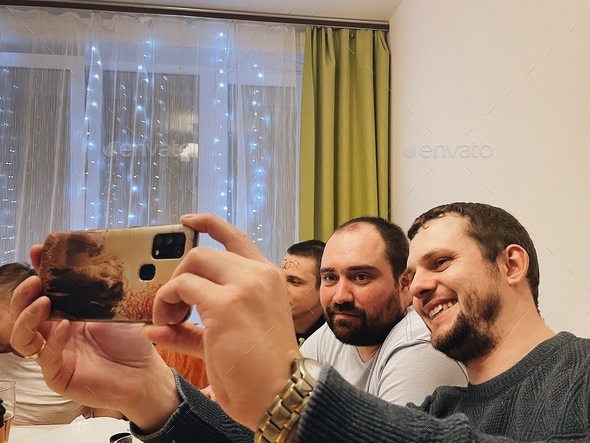 Two boys snapping photo with smartphone Stock Photo by romadope | PhotoDune